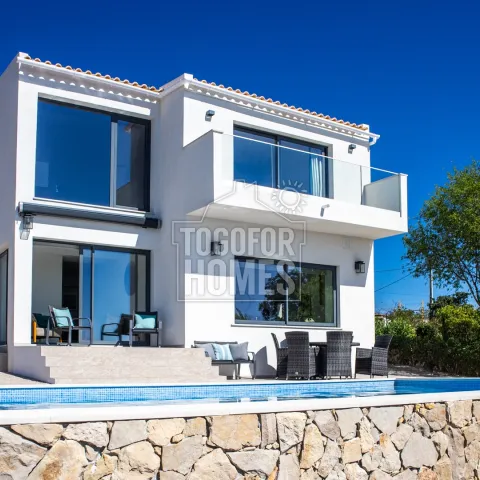 How much does a modern family home with a swimming pool cost in Santa ...